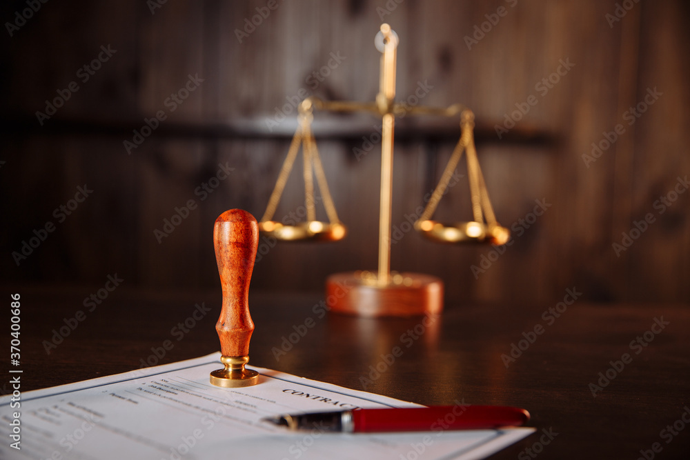 Notary's public pen and stamp on a contract. Notary public tools. Stock ...
