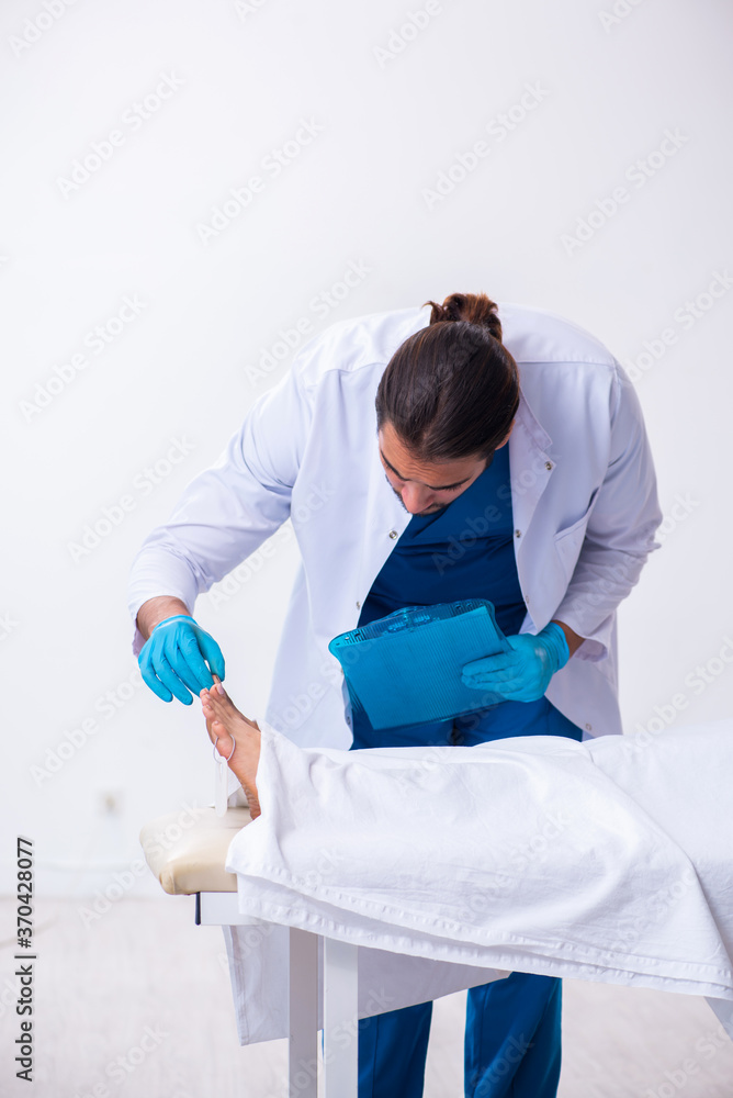 Police coroner examining dead body corpse in morgue Stock Photo | Adobe ...