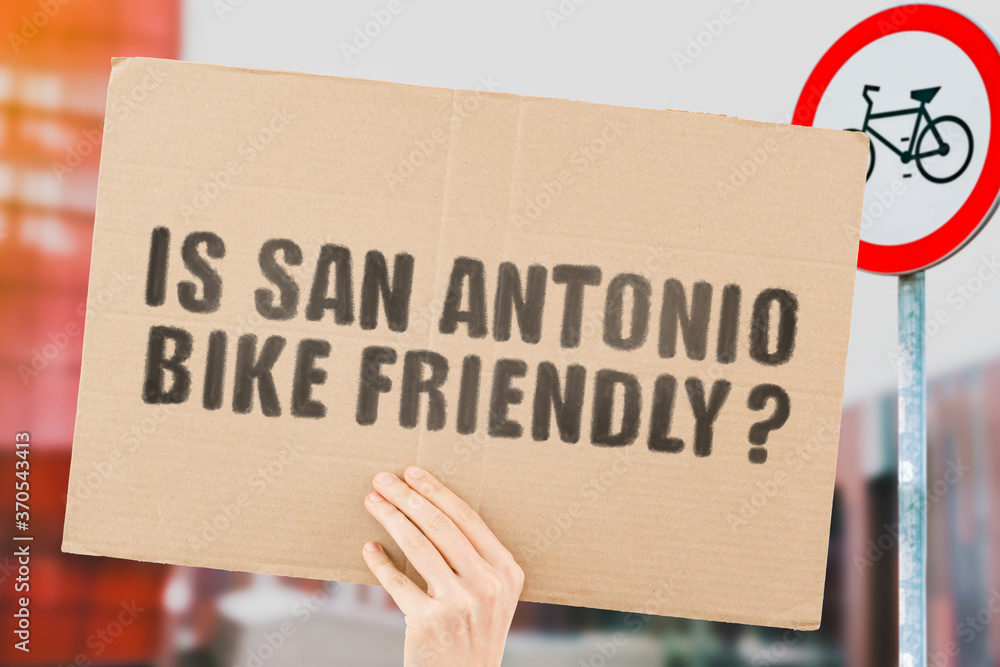 The question " Is San Antonio bike friendly? " on a banner in men's ...