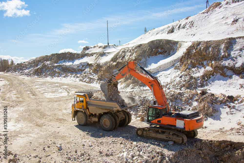 Quarry extraction of silicon. Minerals. Loading and transportation of ...