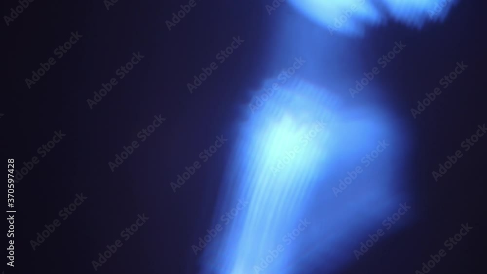 Blue spot light beam flaring Stock Video | Adobe Stock