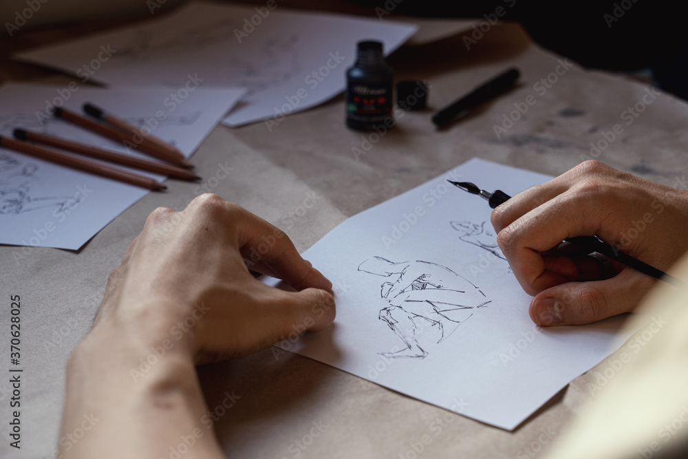 Drawing, sketching the human figure with a ink nib pen Stock Photo ...