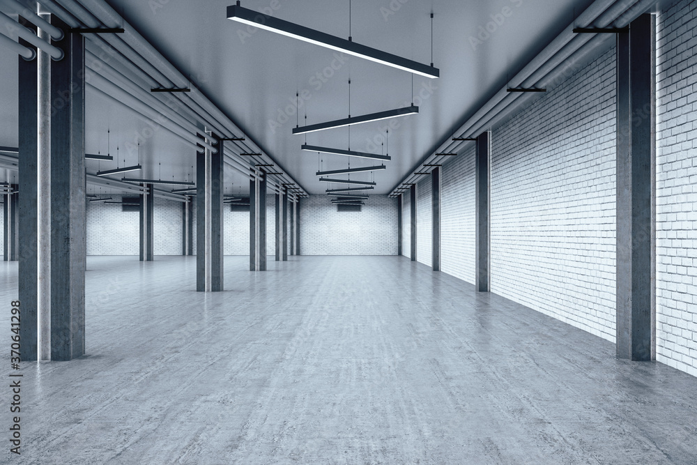 Modern warehouse interior with brick wall and columns. Stock Photo ...