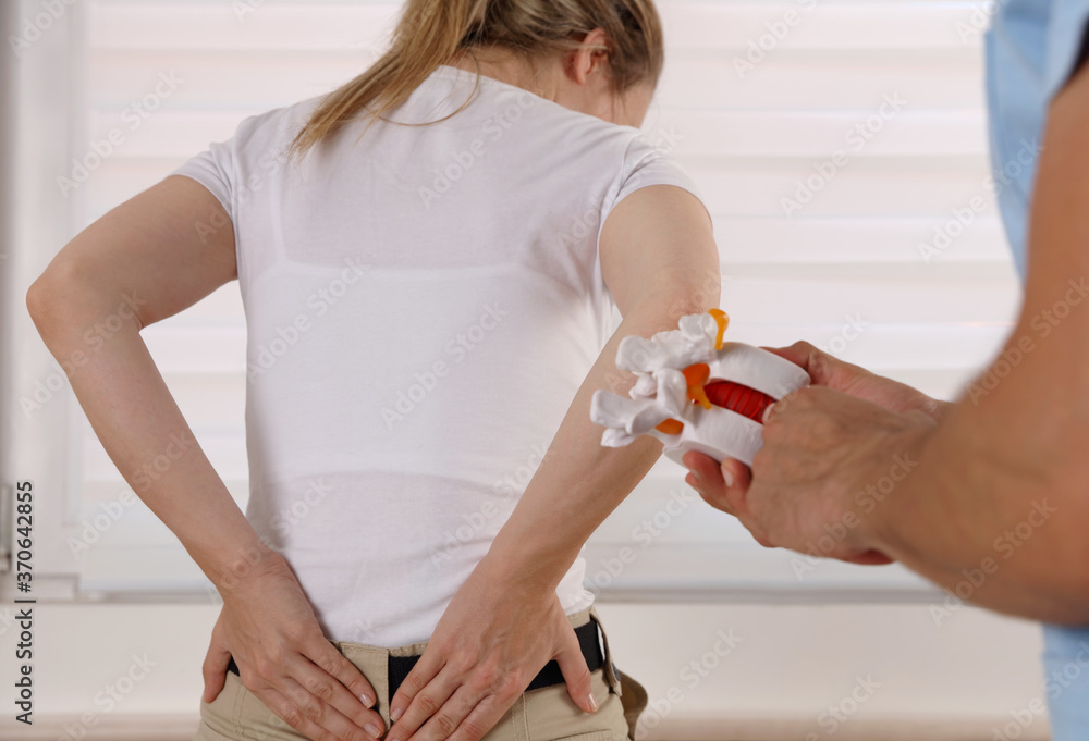 Low Back pain ,pinched nerve. Doctor Chiropractor explains causes of ...