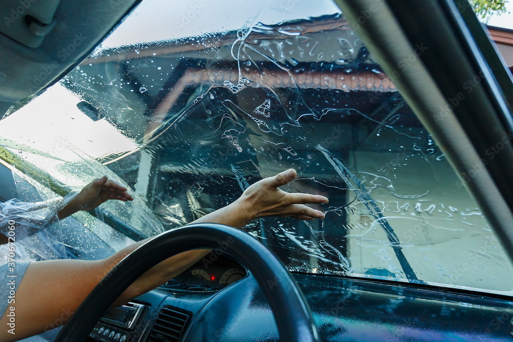 Car Films Installing windshield protection film blur. Stock Photo ...
