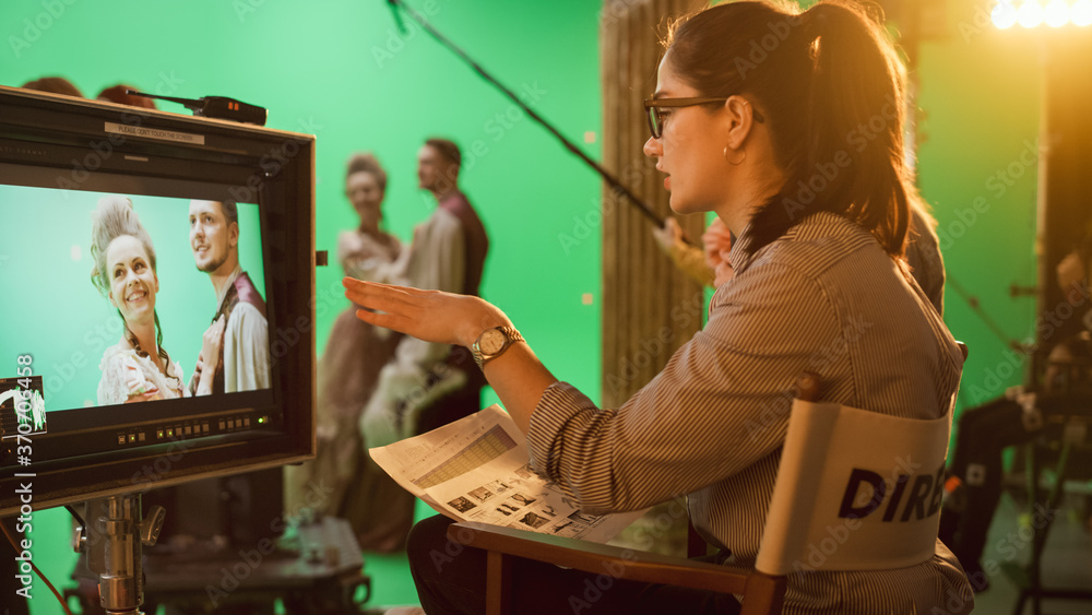 Famous Talented Female Director in Chair Looks at Display Following ...