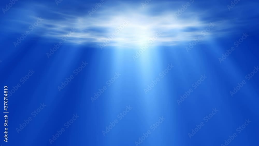 Underwater view with ocean waves flowing in the clear blue water ...