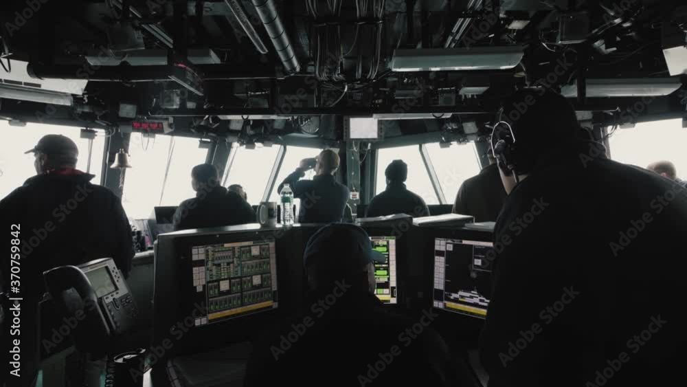 Crew working on navy ship bridge Stock Video | Adobe Stock