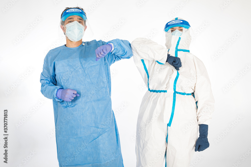 Man wearing PPE and Woman doctor wearing PPE to fight the coronavirus ...