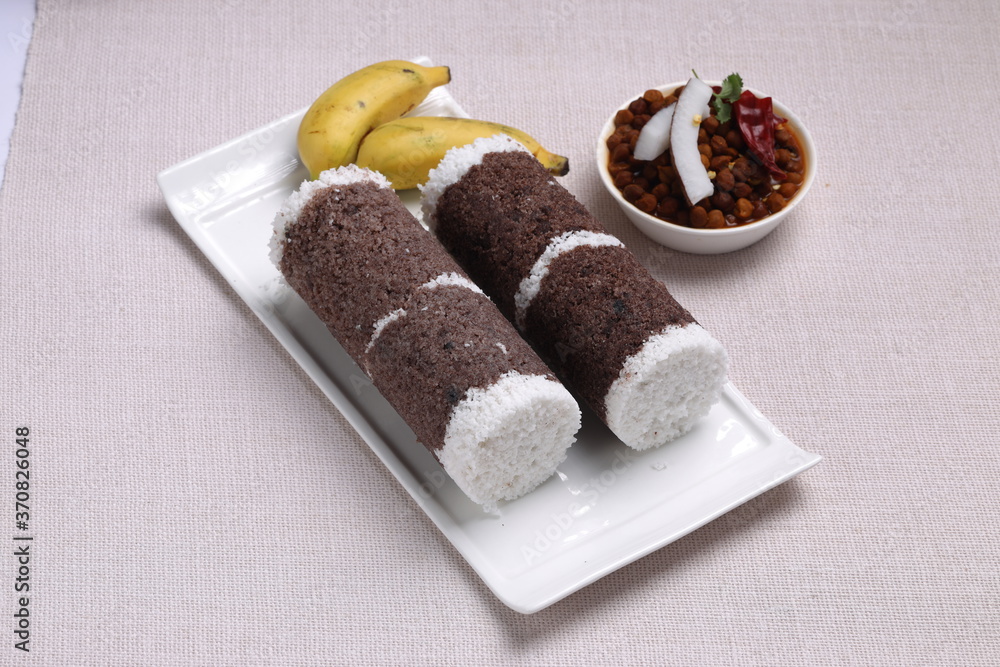 Foto de Ragi Puttu or Finger Millet steamed cake with bengal gram curry ...