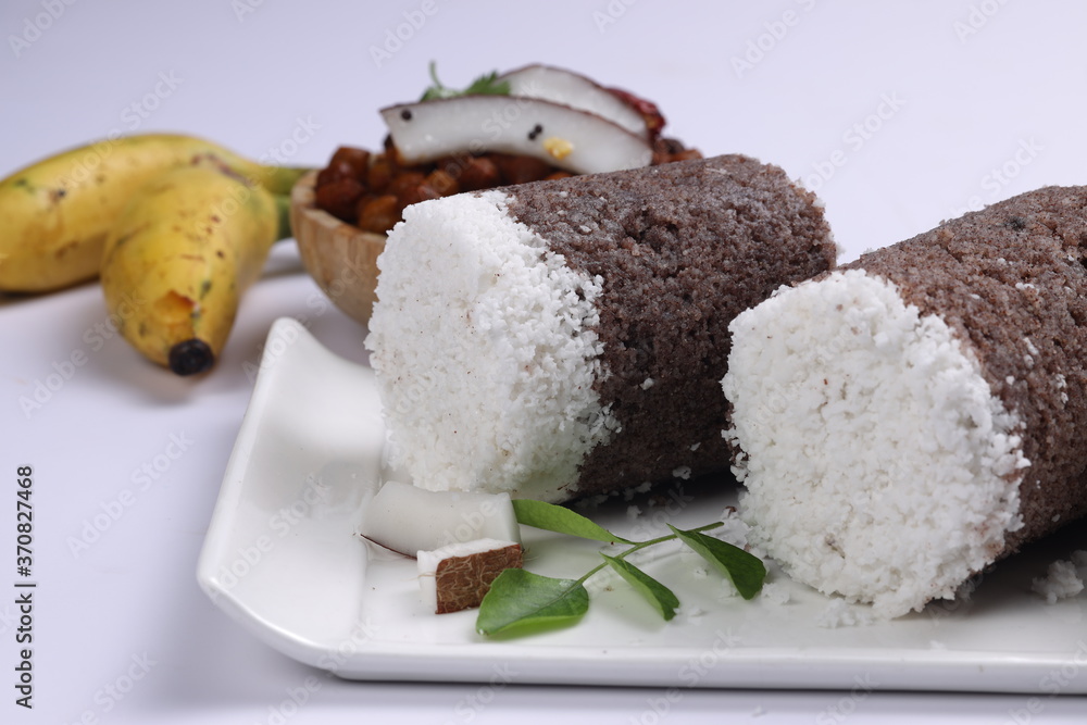 Foto de Ragi Puttu or Finger Millet steamed cake with bengal gram curry ...