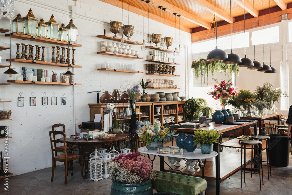 Interior of modern floral shop with various bouquets and decorative ...