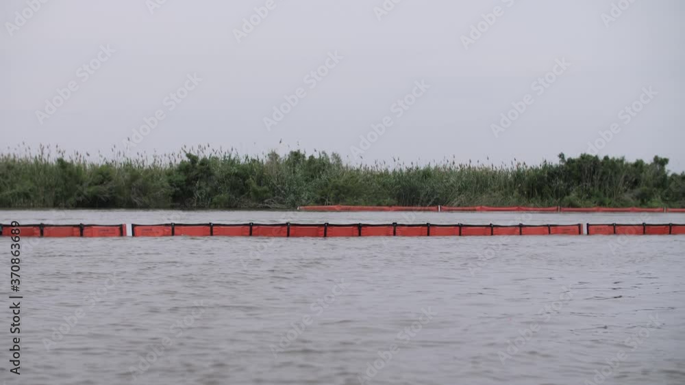 booms, oil spills, floating barriers Stock Video | Adobe Stock
