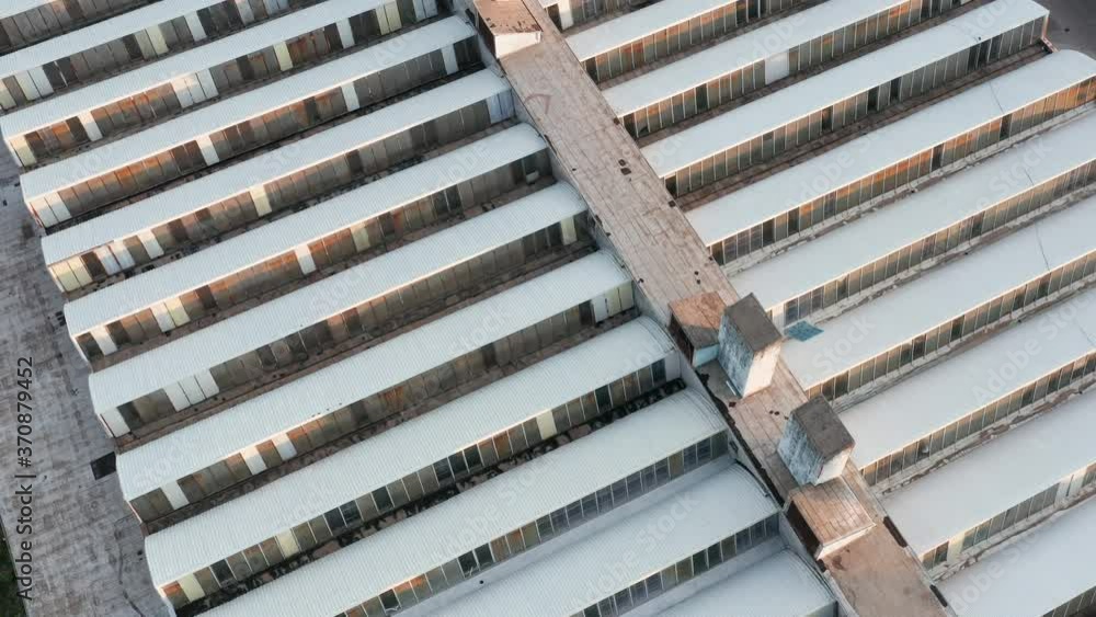 Video Stock Saw-tooth roof of a factory. Series of glass panels on the ...