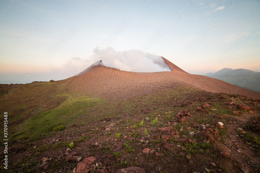 scenic panorama of the active volcano Telica with the first light of ...