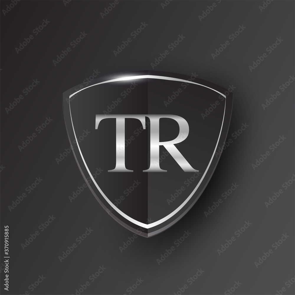 Initial logo letter TR with shield Icon silver color isolated on black ...