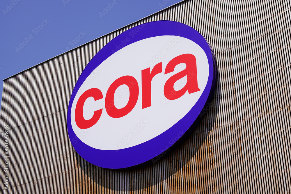 Cora hypermarket logo and sign on supermarket entrance Stock Photo ...