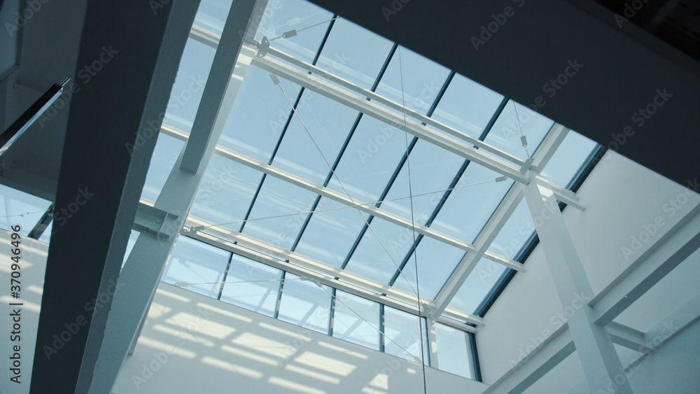 Modern architecture detail glass ceiling in the office building roof ...