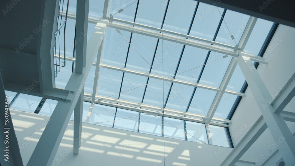 Modern architecture detail glass ceiling in the office building roof ...