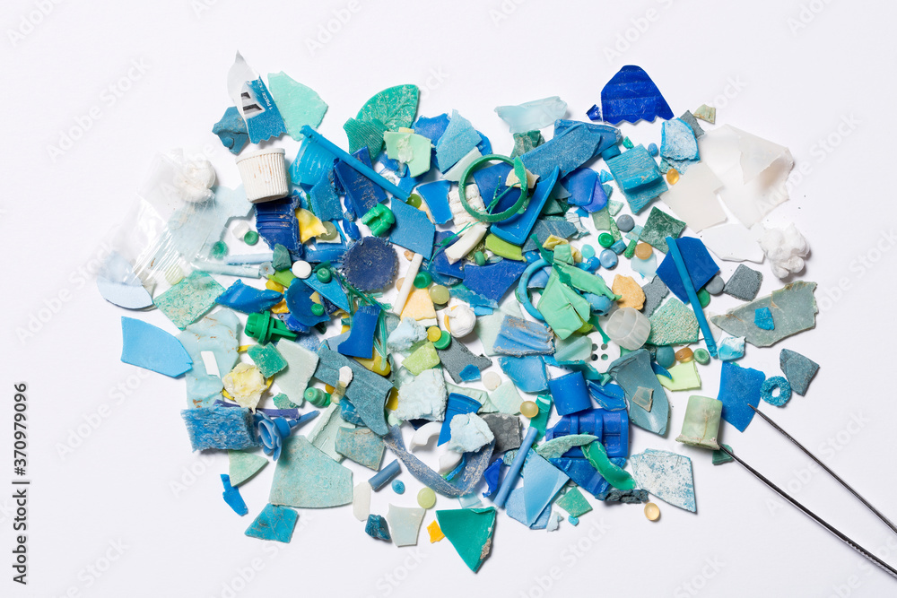 Different types of microplastics with tweezer Stock Photo | Adobe Stock