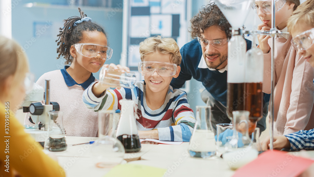 Elementary School Science Classroom: Little Boy Mixes Chemicals in ...
