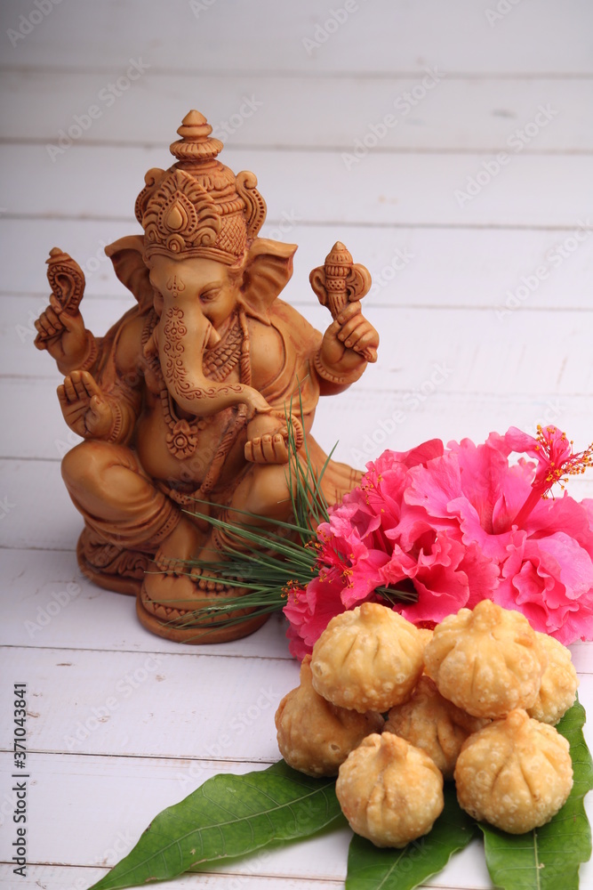 Indian Food: Idol of lord Ganesha with modak Maharashtra Sweet Dish ...