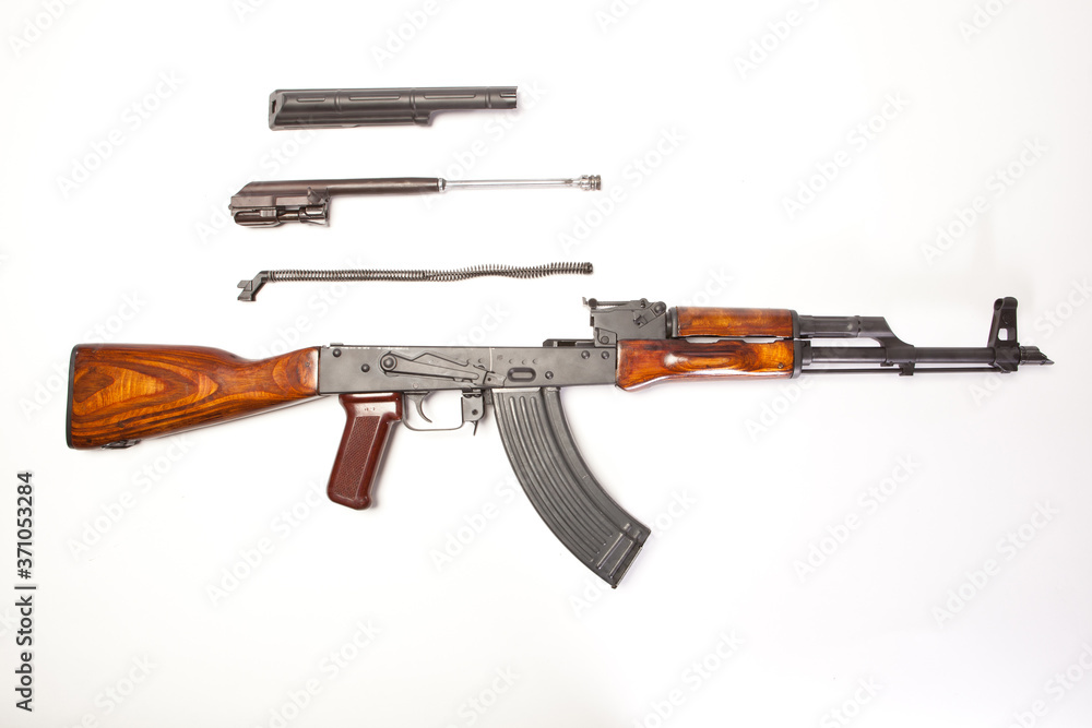 Parts of an AK-47 displayed on a white background. Stock Photo | Adobe ...