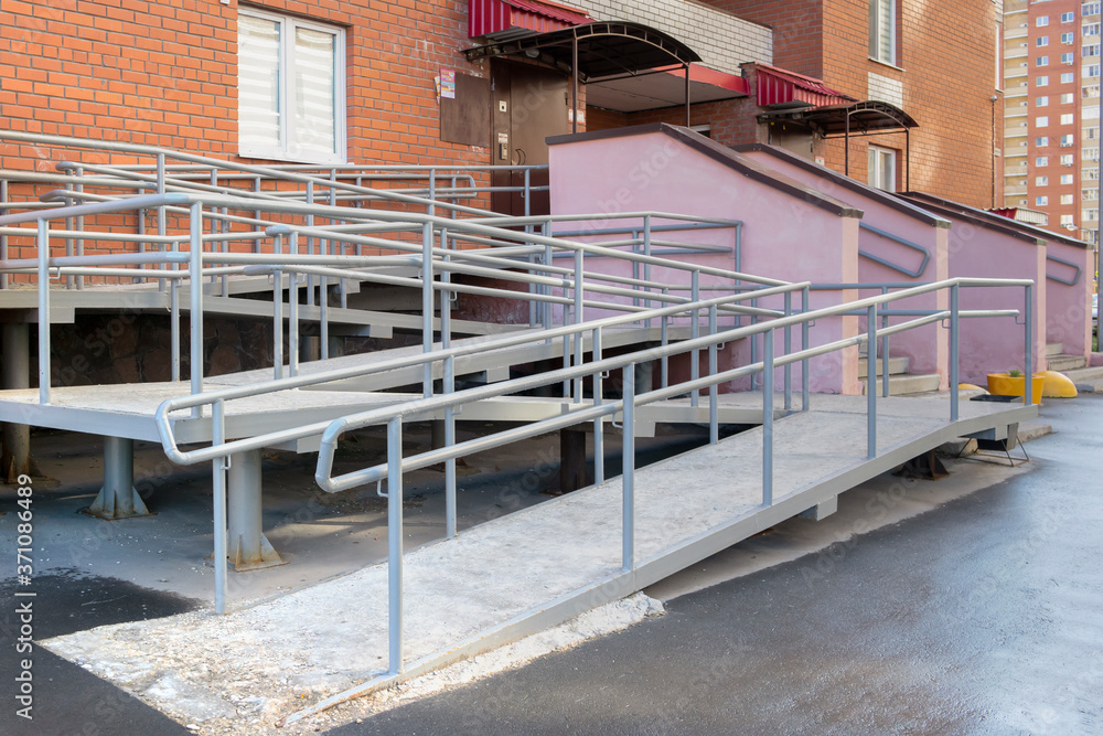 Multilevel entrance ramp. Difficult access for disabled persons Stock ...