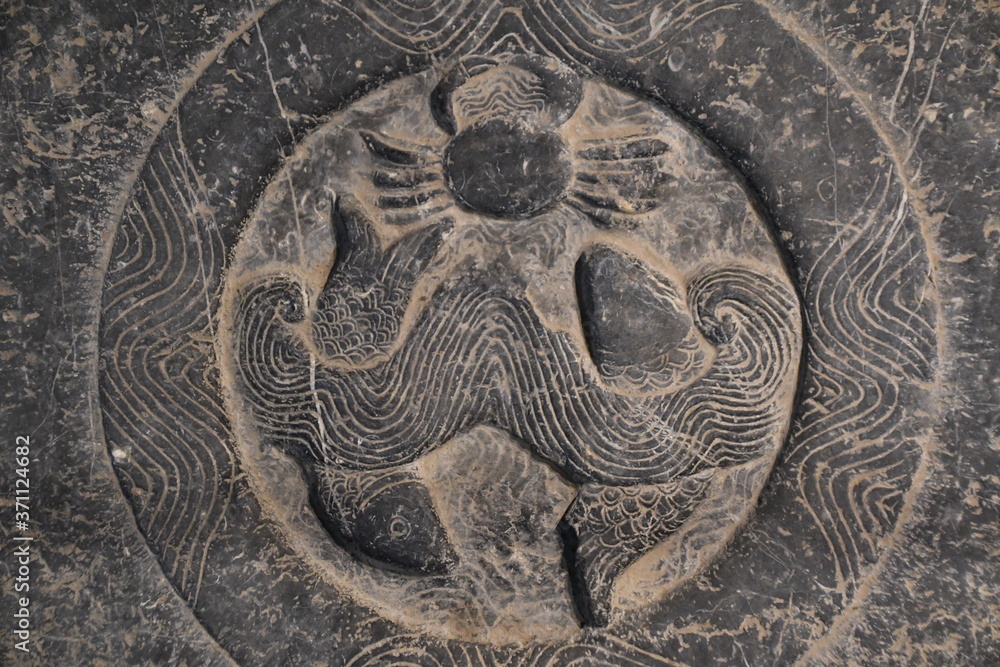 Ancient Chinese Garden stone depicting engraved zodiac signs such as ...