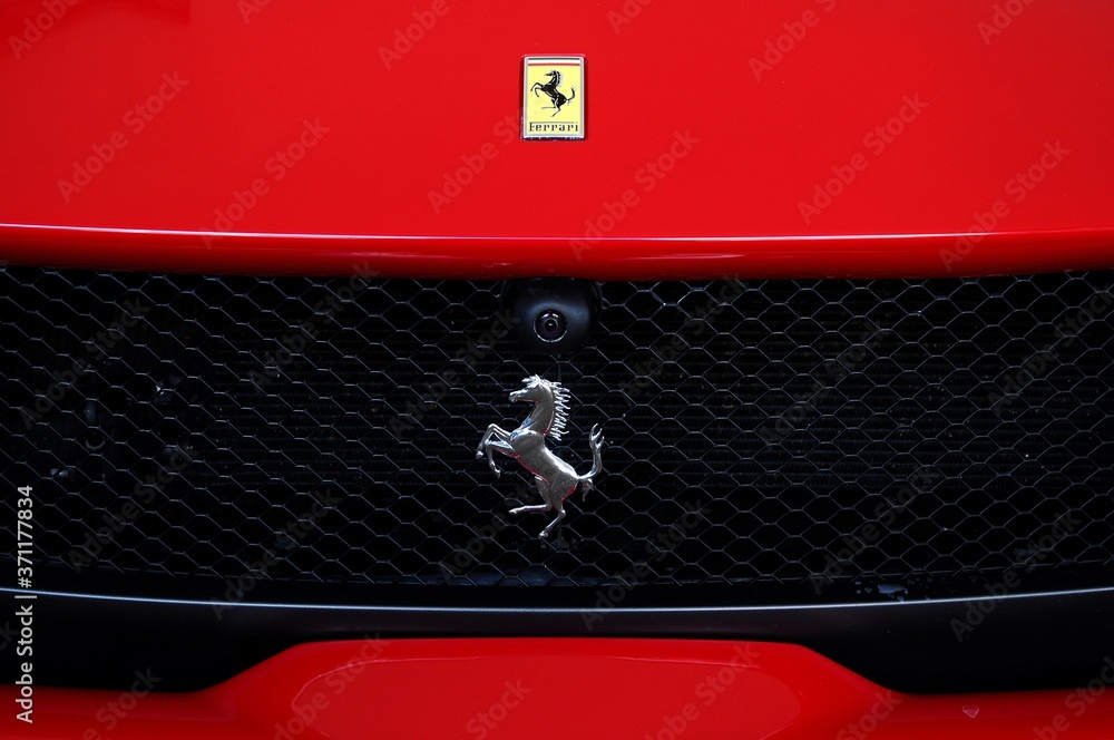 Ferrari Logo on Red Sport Car in the paddock of Mugello Circuit ...
