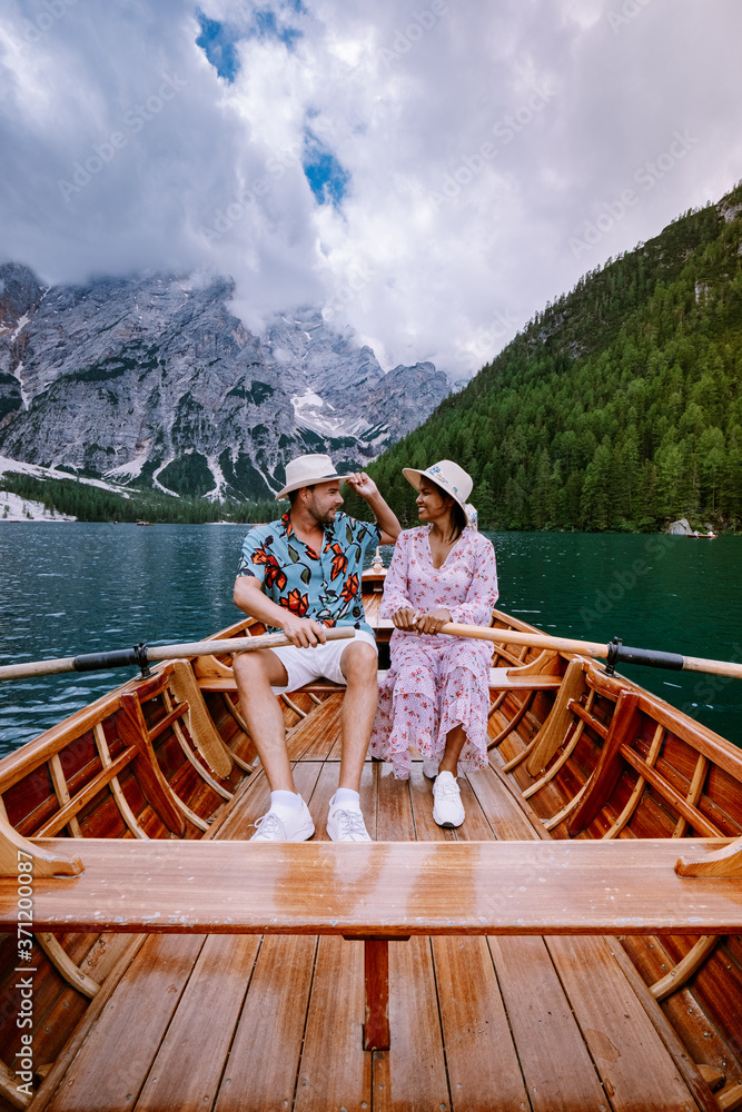 couple visit the famous lake Lago Di Braies Italy, Pragser Wildsee in ...