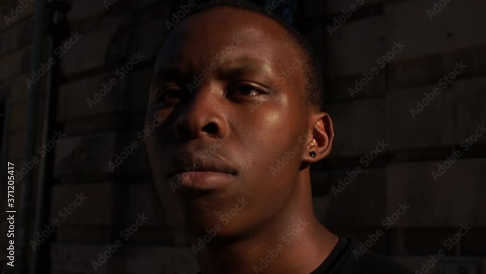 Vidéo Stock Black man, African student. Close urban portrait of a ...