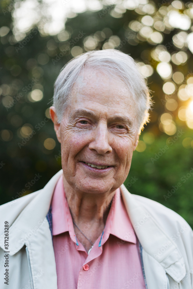 Smiling older man outside. Stock Photo | Adobe Stock