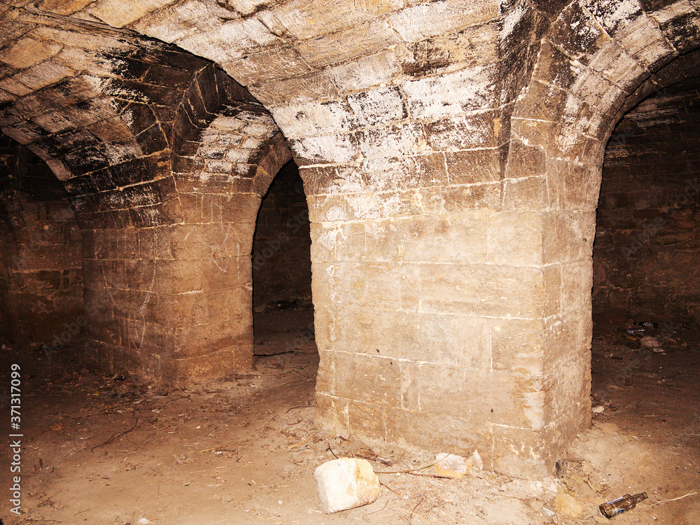 Mystic interior of an ancient dungeon. An old abandoned tunnel in an ...