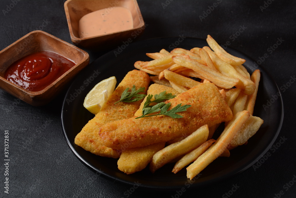 Traditional English Food - Fish and Chips. Fried fish filets and crispy ...