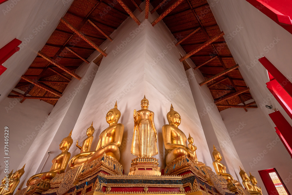 Group of golden Buddha statue sitting and standing posture in the ...