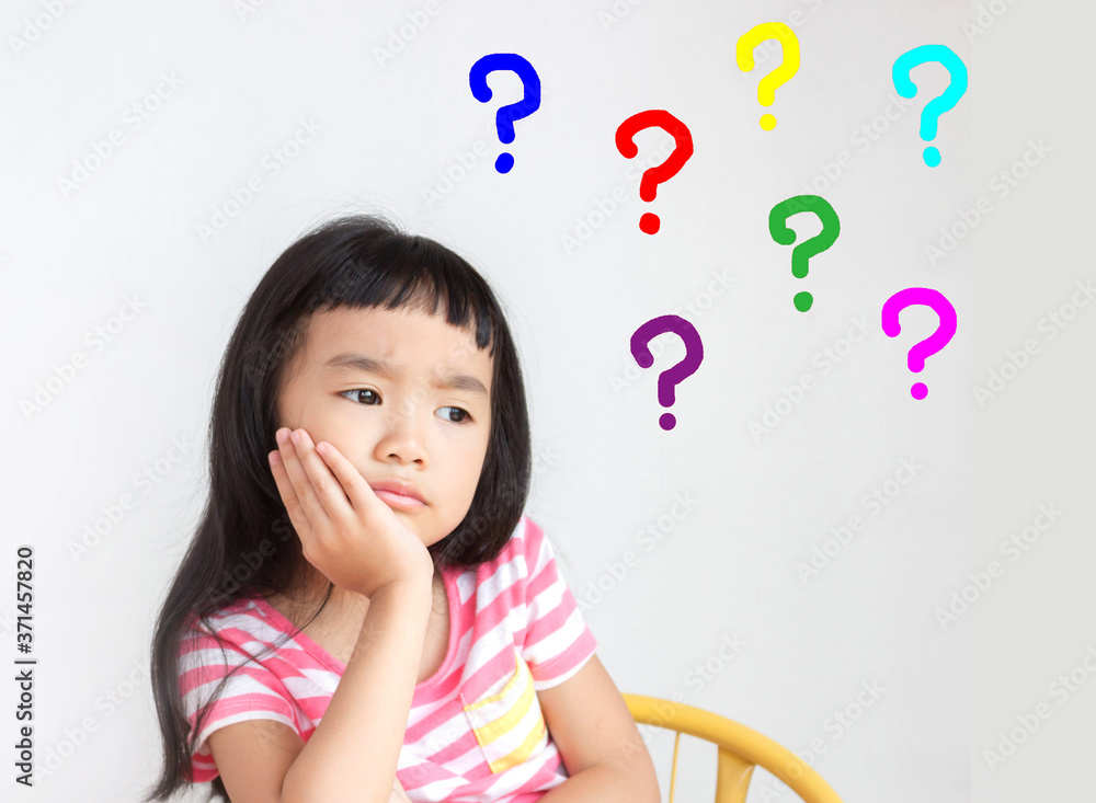 asian child strain,angry,bored ,she rest her chin on right hand with ...