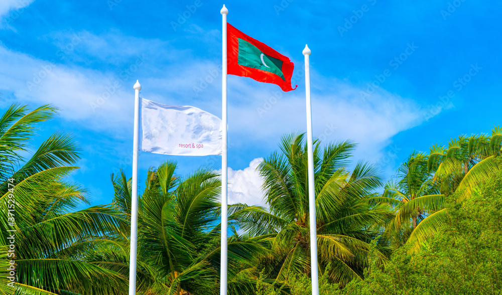 Maldives national flag on blue sky background Stock Photo | Adobe Stock