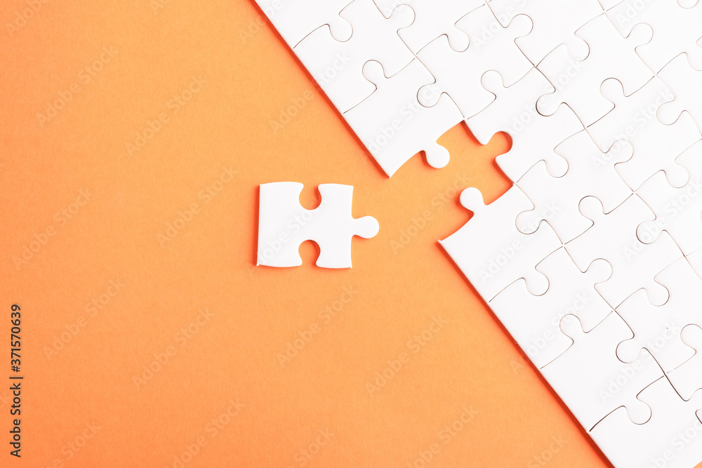 Top view flat lay of paper plain white jigsaw puzzle game texture last ...