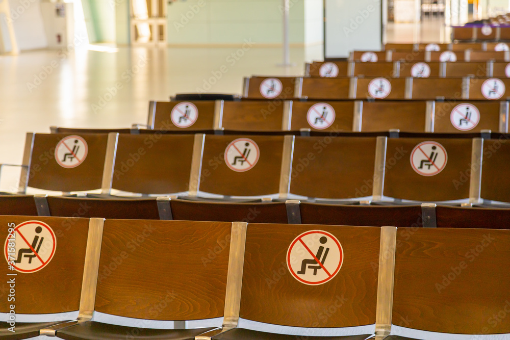 Transportation in post coronavirus era. Empty airport seats with social ...
