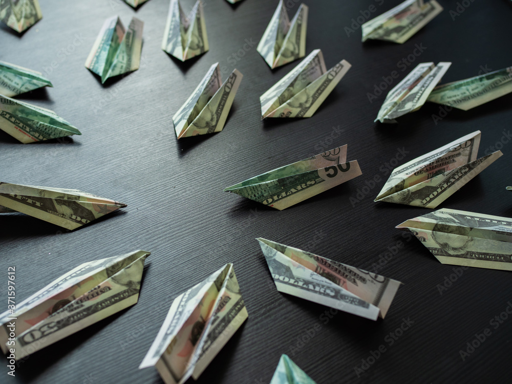 Paper planes made of dollar bills, usd cash flow concept. Global ...