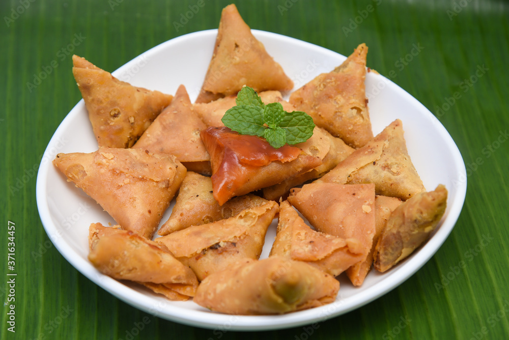 Chicken samosa, Pakoda deep fried snack in coconut oil Kerala, India ...