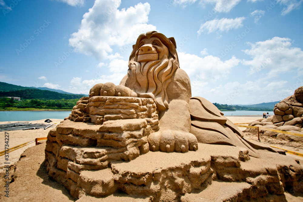 lion sand sculpture Stock Photo | Adobe Stock