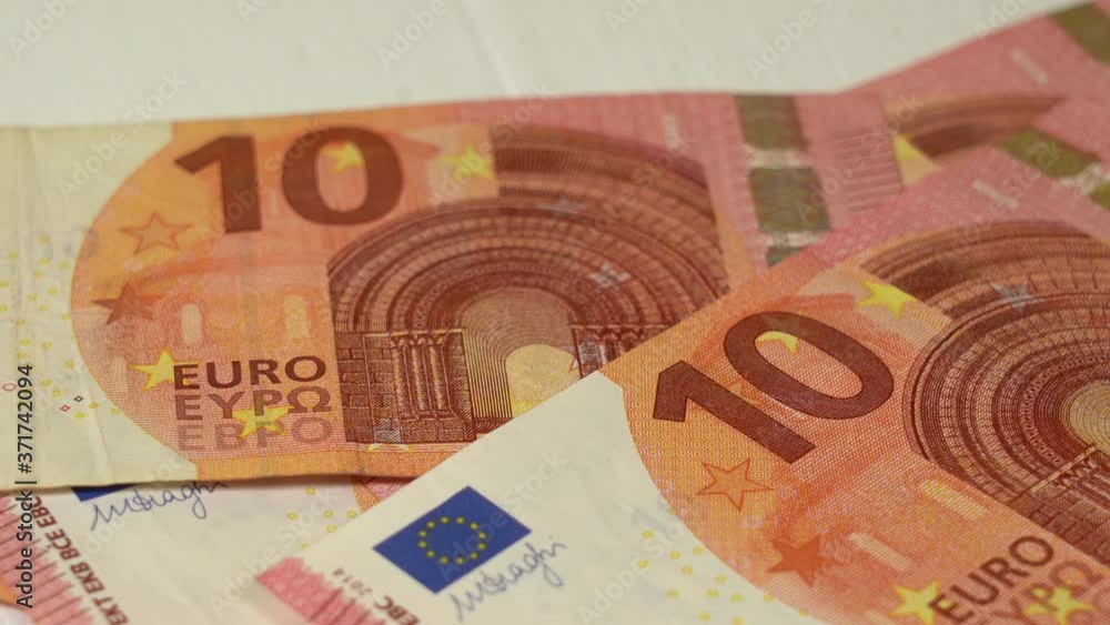Vidéo Stock Clsoeup macro view 4k video of several 10 euro paper money ...