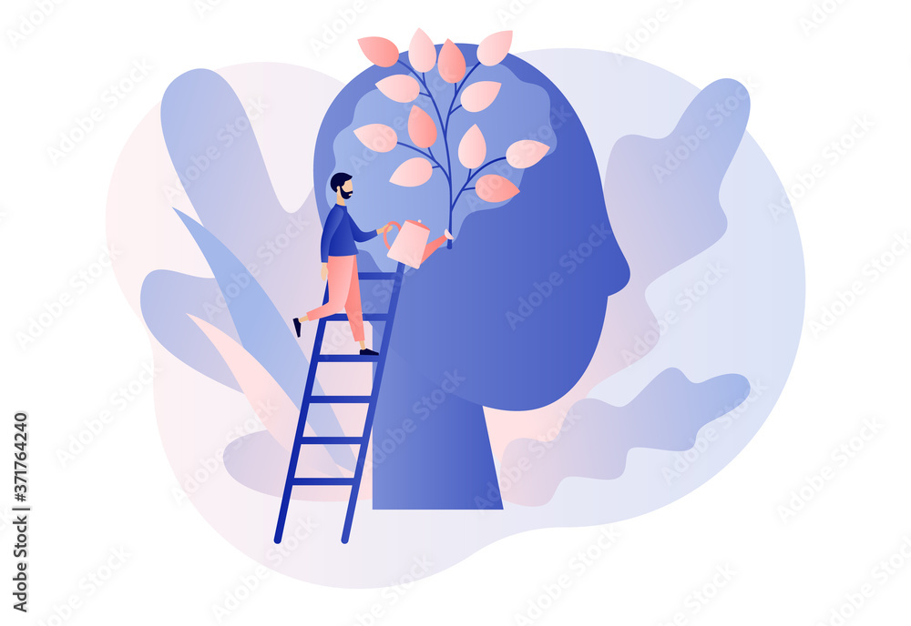 Personal growth. Tiny man watering that growing plant from the brain as ...