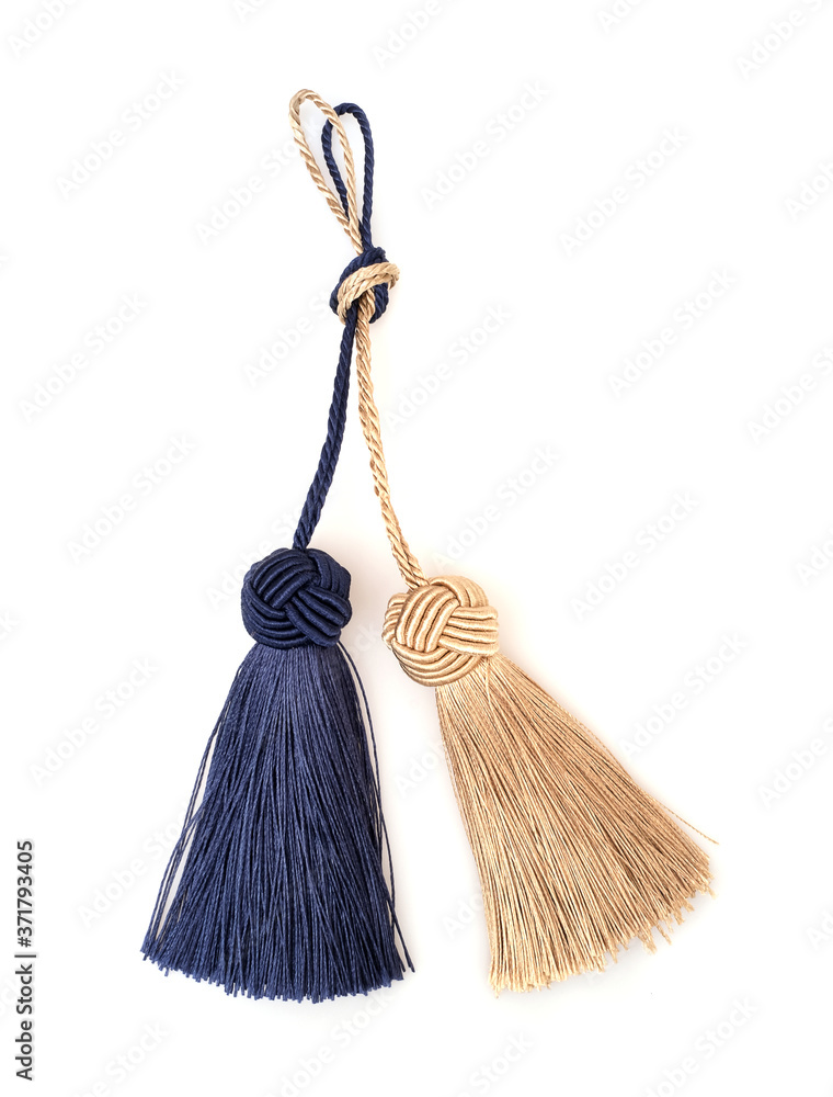 Blue and golden silk tassels isolated on white background for creating ...