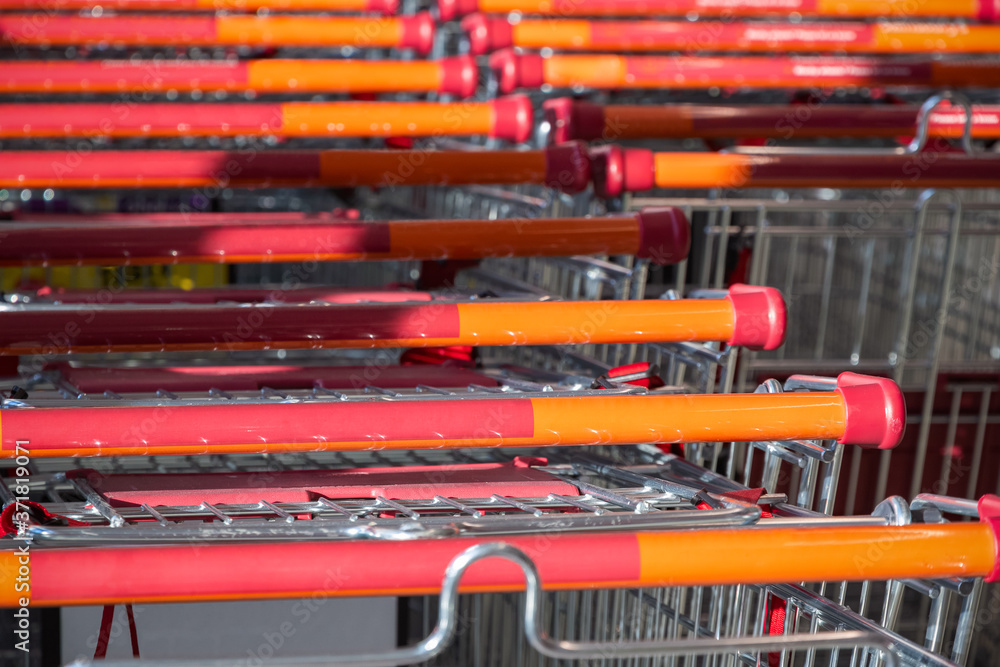 Trolleys stacked in lines at a supermarket in London Stock Photo ...