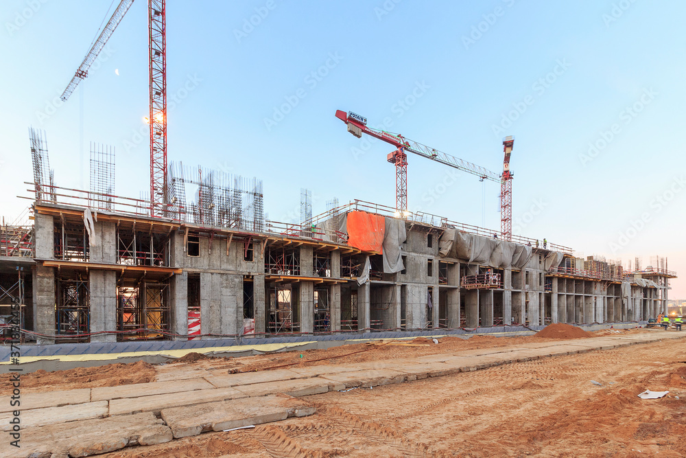 Reinforcement work and installation of formwork. Concrete is poured in ...