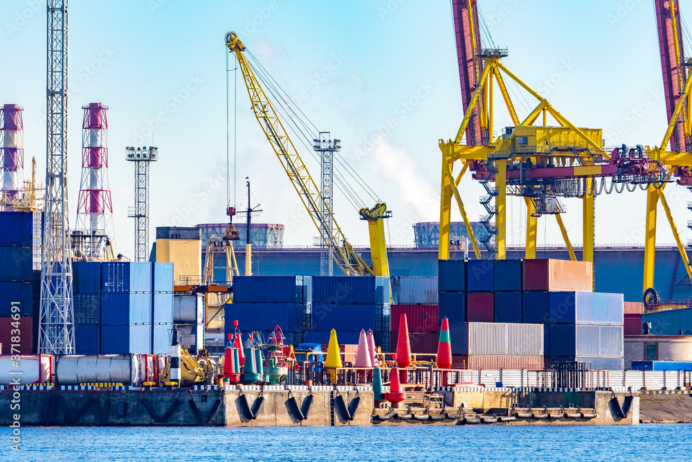 Cargo shipyards in seaport. Loading terminal with many containers. Sea ...