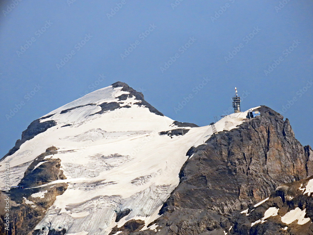 Snowy alpine peaks Titlis and Small Titlis (Klein Titlis) with the ...